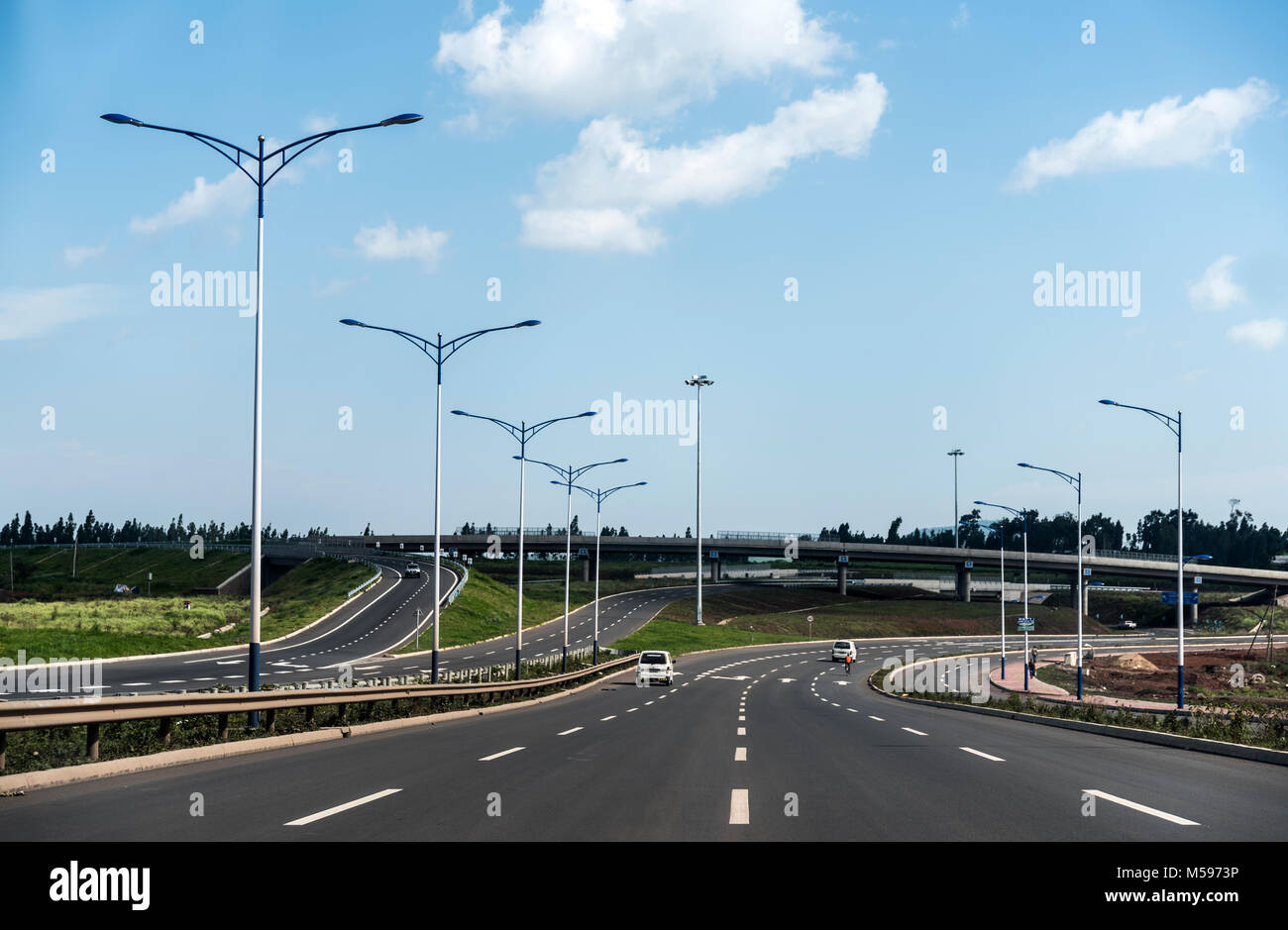 Addis Ababa Highway surrounded by green trees and mountains - Ethiopia ...
