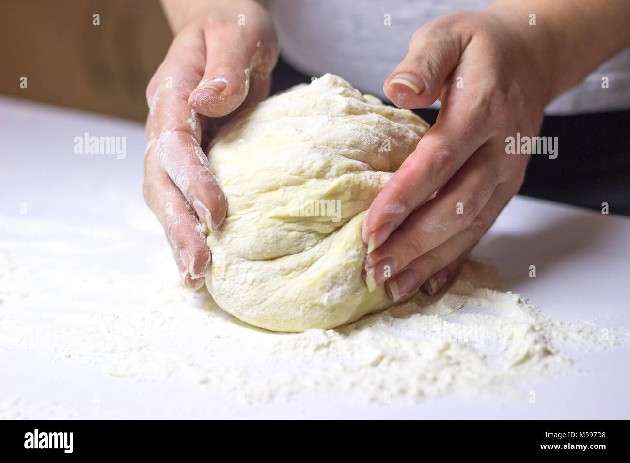 Woman making dough wooden hi-res stock photography and images - Alamy