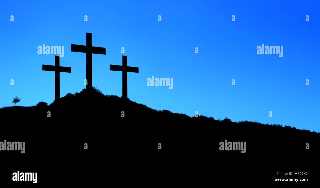 Religious illustration with three backlit crosses on a hill and blue ...