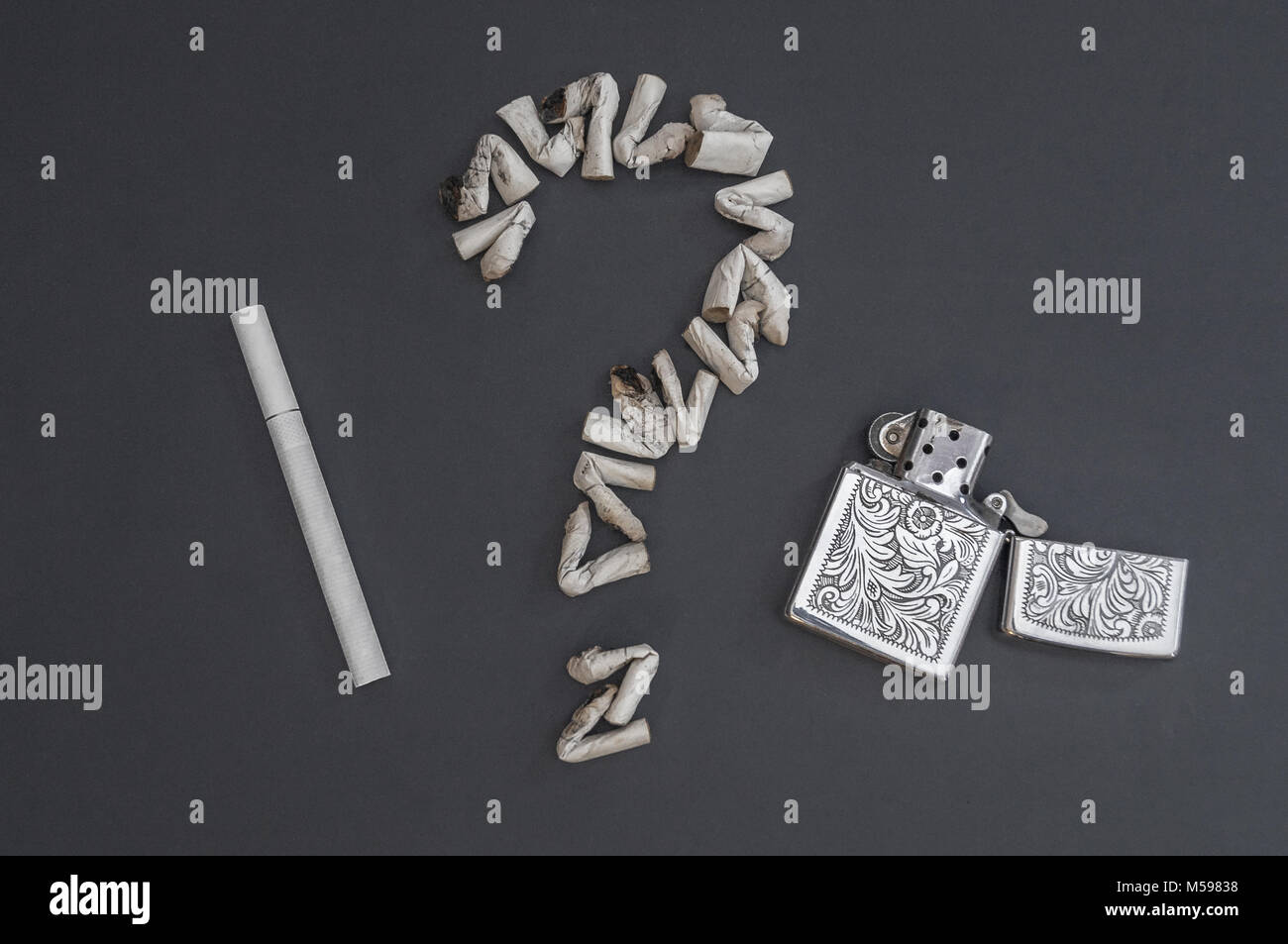 The Cigarette and gasoline lighter question mark is made from cigarette ...