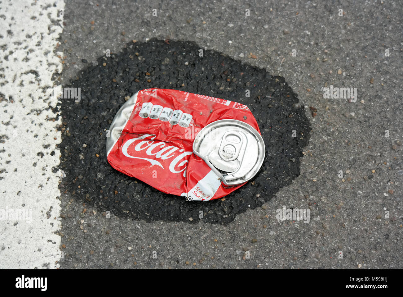 flat-ridden coca-cola can Stock Photo - Alamy