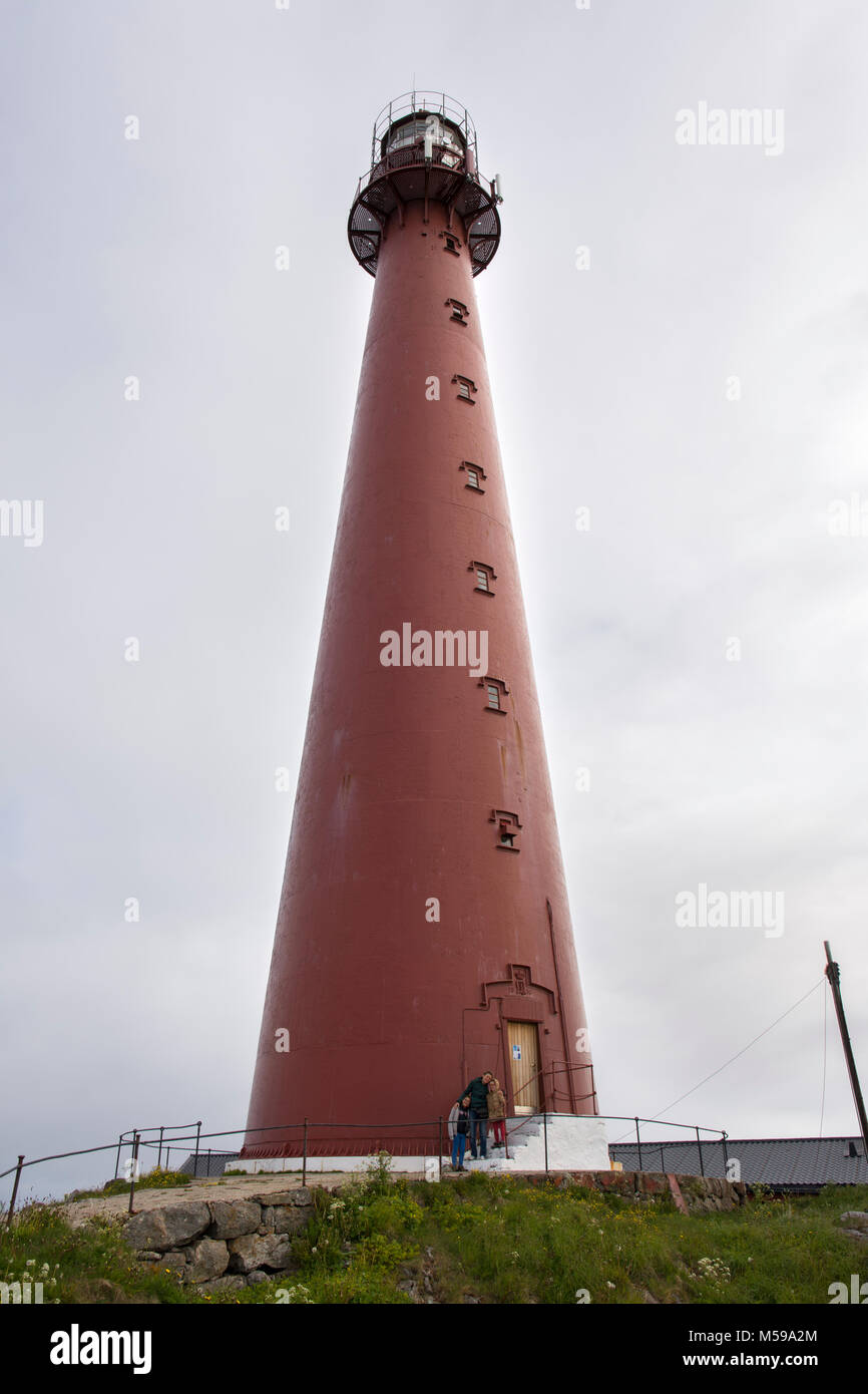 red lighthouse in Andenes at the beginning of National Tourist Route ...