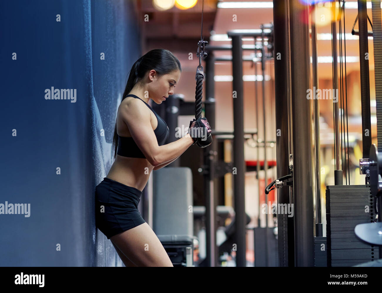 Woman flexing muscle arm hi-res stock photography and images - Alamy