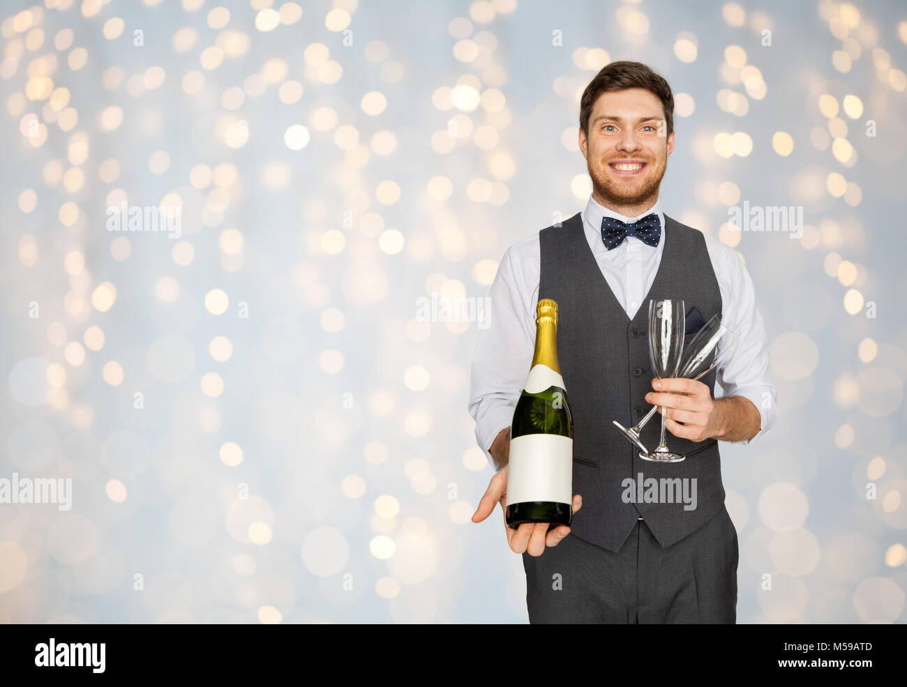 man with bottle of champagne and glasses at party Stock Photo - Alamy