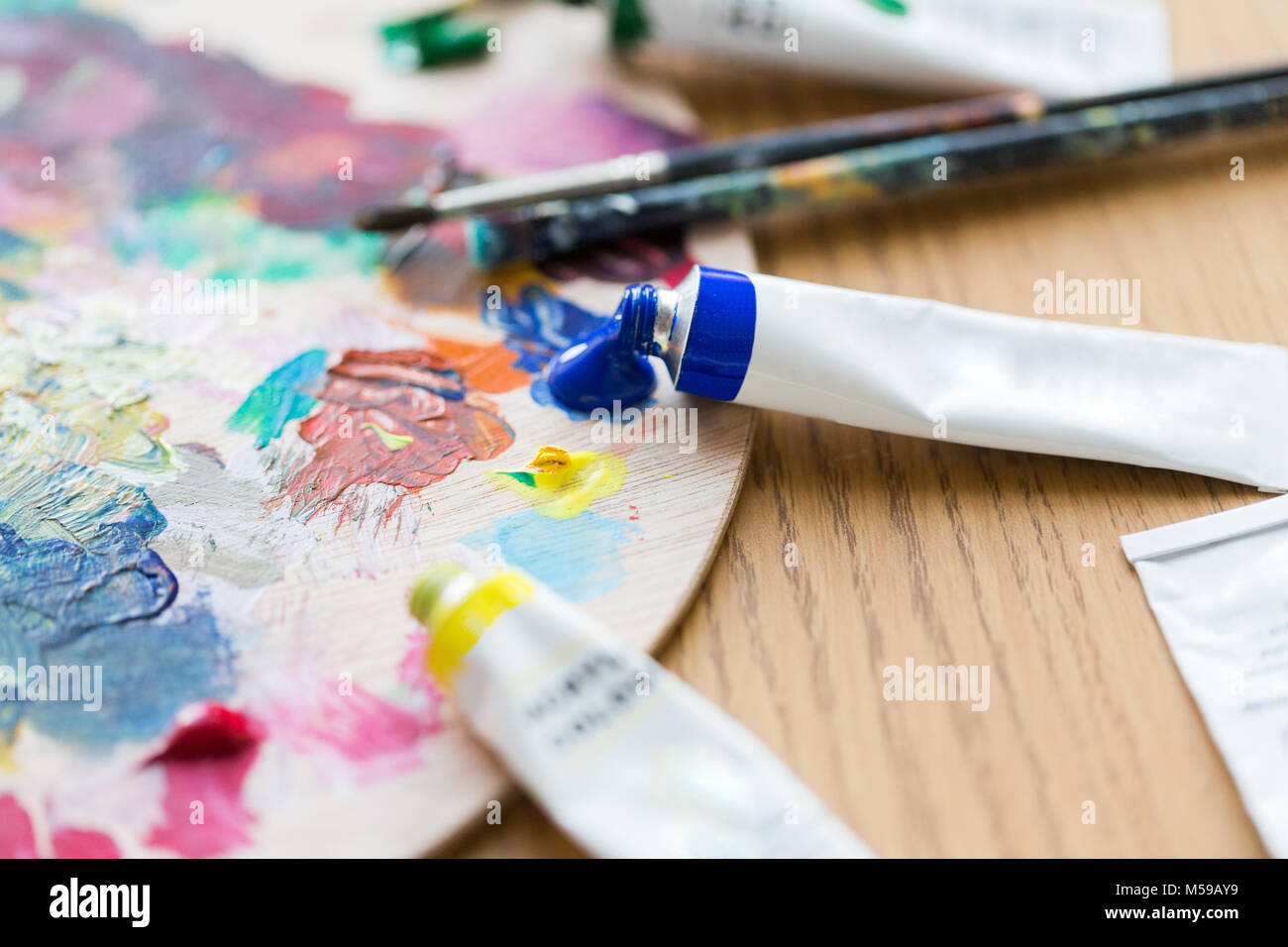 acrylic color or paint tubes and palette Stock Photo - Alamy