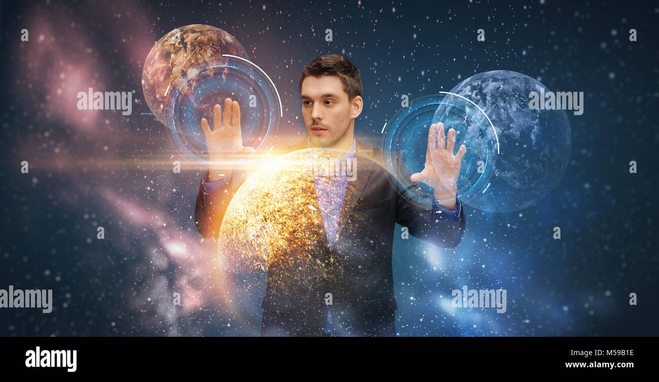 businessman with virtual planets and space Stock Photo - Alamy