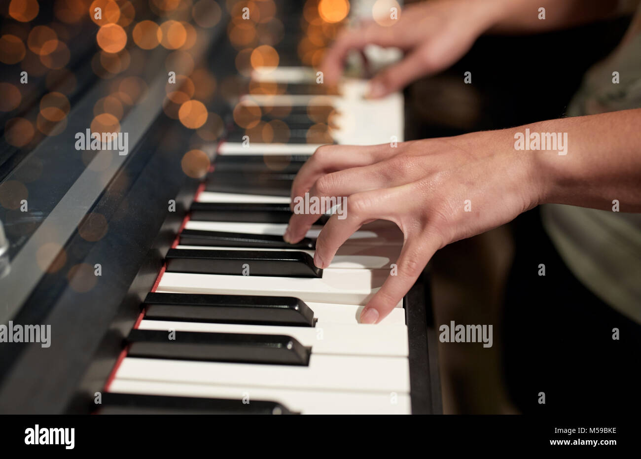 Hand piano hi-res stock photography and images - Alamy