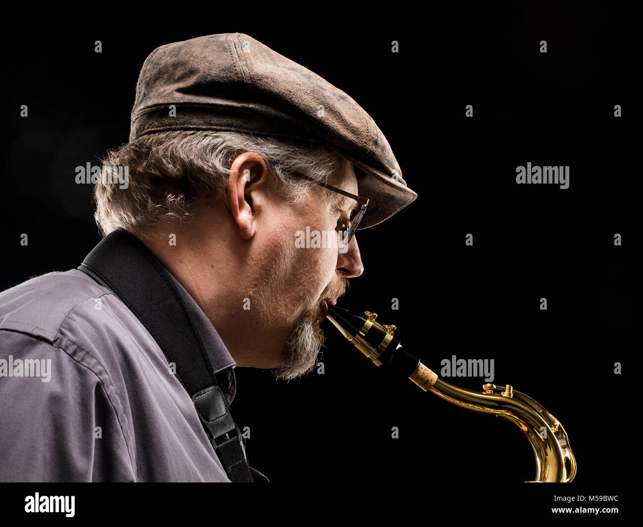 Saxophone player male hi-res stock photography and images - Alamy
