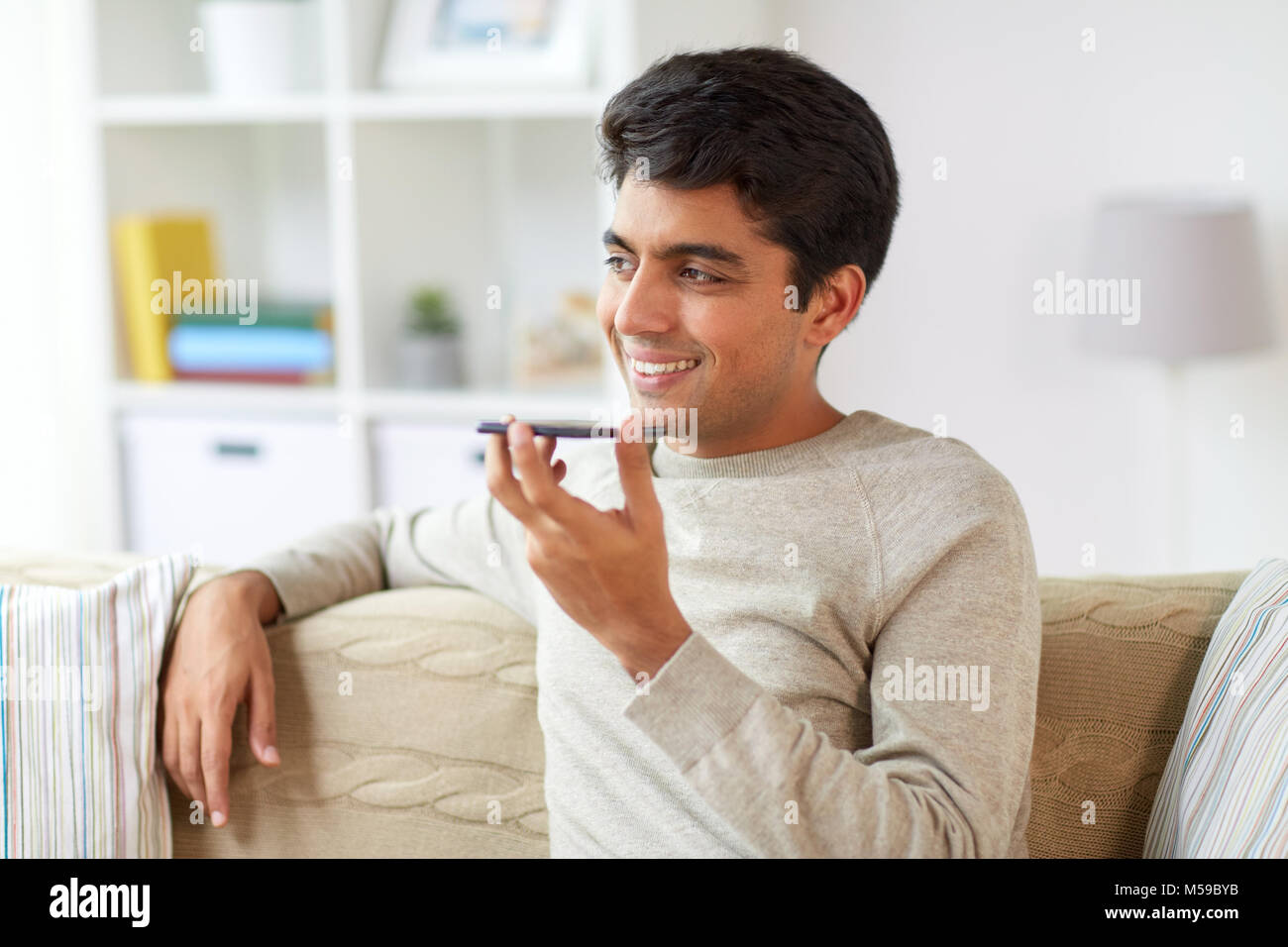 man using voice command recorder on smartphone Stock Photo - Alamy