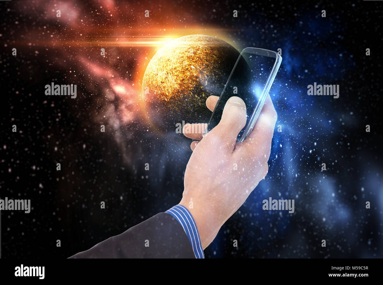 hand holding smartphone over planet in space Stock Photo - Alamy