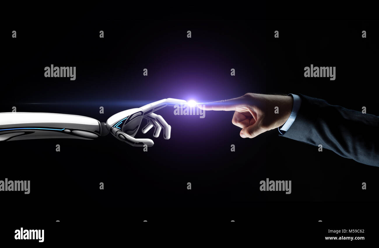 robot and human hand connecting fingers Stock Photo - Alamy