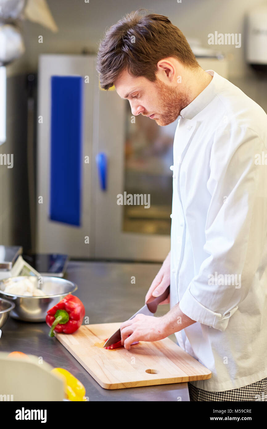 happy male chef cooking food at restaurant kitchen Stock Photo - Alamy