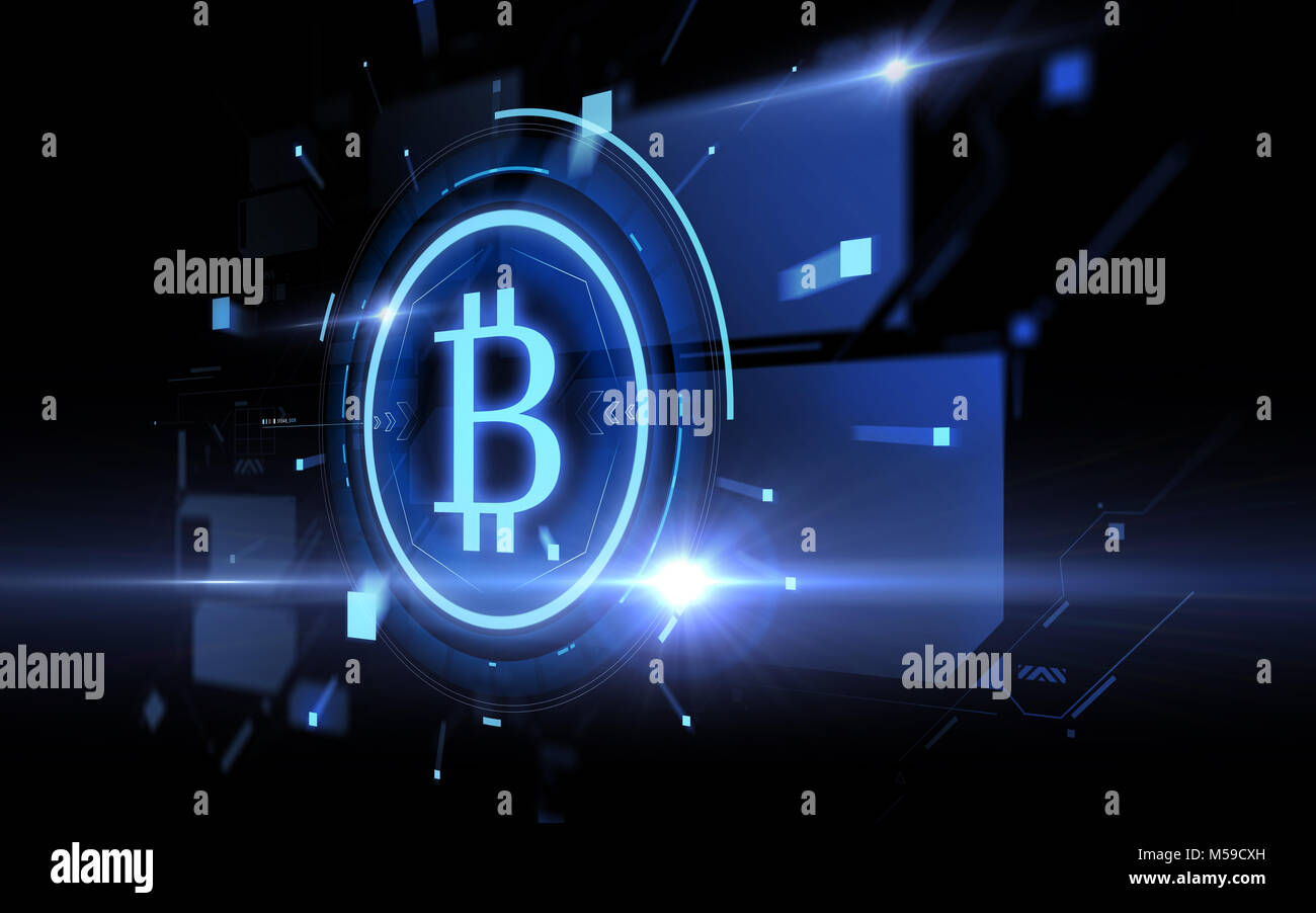 blue bitcoin projection over black background Stock Photo - Alamy
