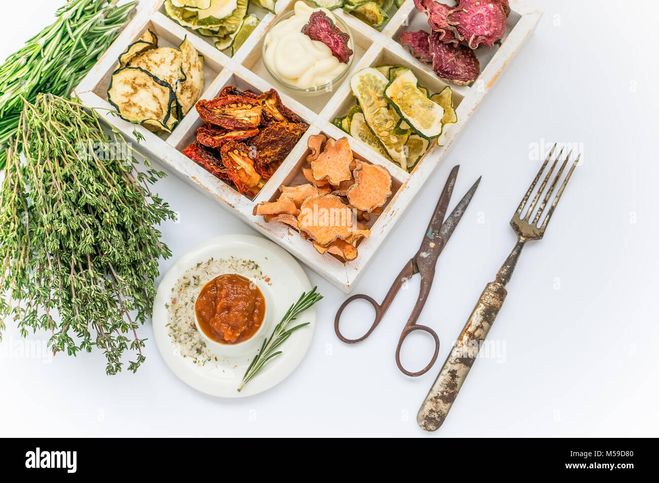 Homemade colorful chips from different fresh vegetables and carrots in ...