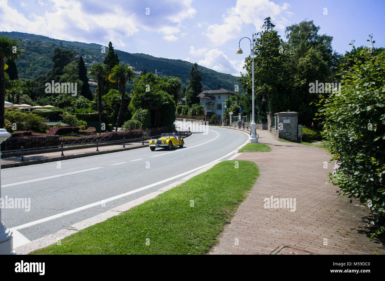 tourist traveling with his convertible car, on the roads of Lake ...