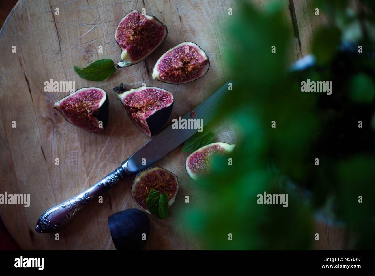 Fresh figs cut and ready to be eaten Stock Photo - Alamy