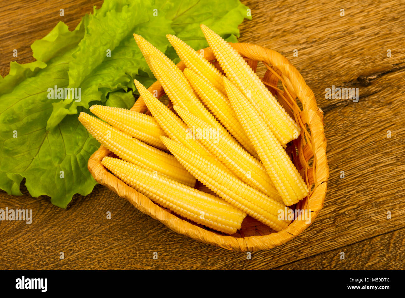 Young raw baby corn Stock Photo - Alamy