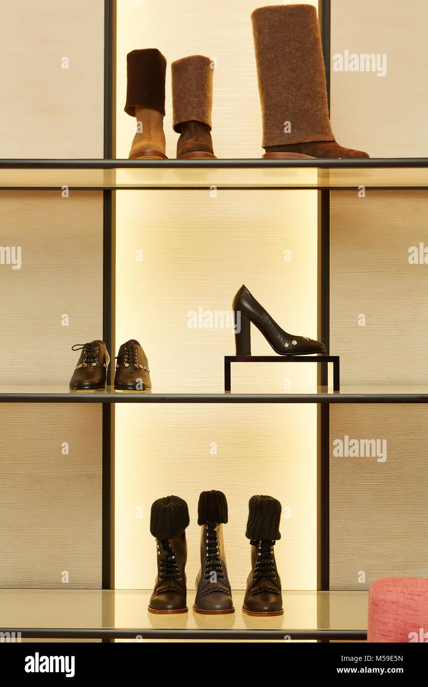 Bright large luxury shoe store with new collection Stock Photo - Alamy