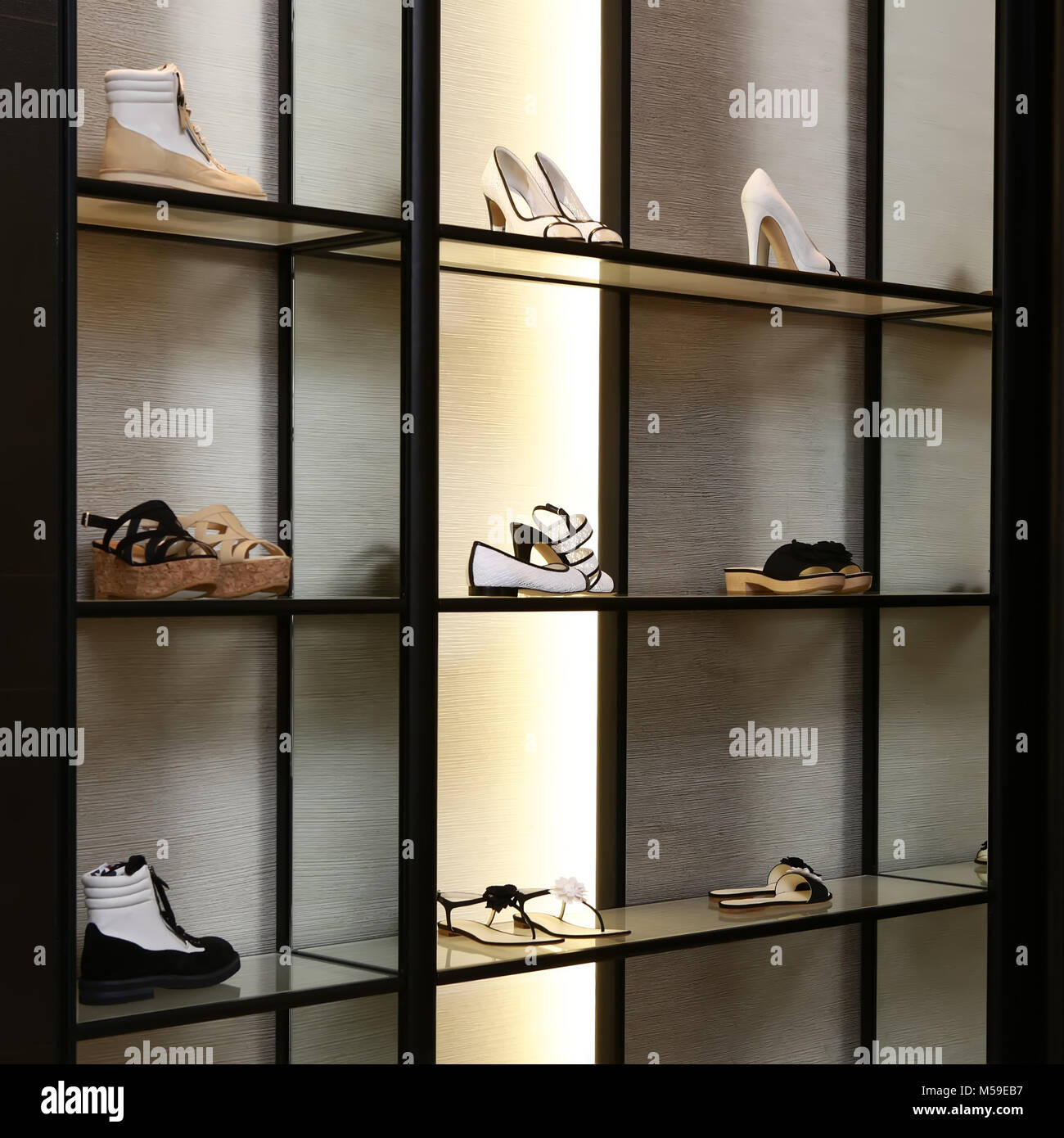 Bright large luxury shoe store with new collection Stock Photo - Alamy