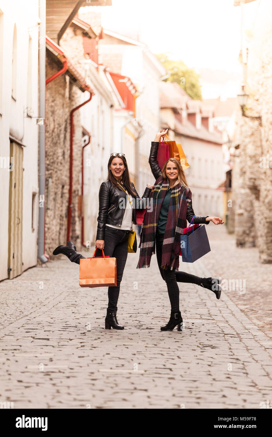 Attractive students going shopping after working on a diploma Stock ...