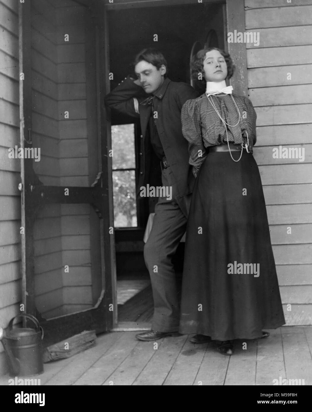 Uniformed young man and a young woman are in love, ca. 1900 Stock Photo ...