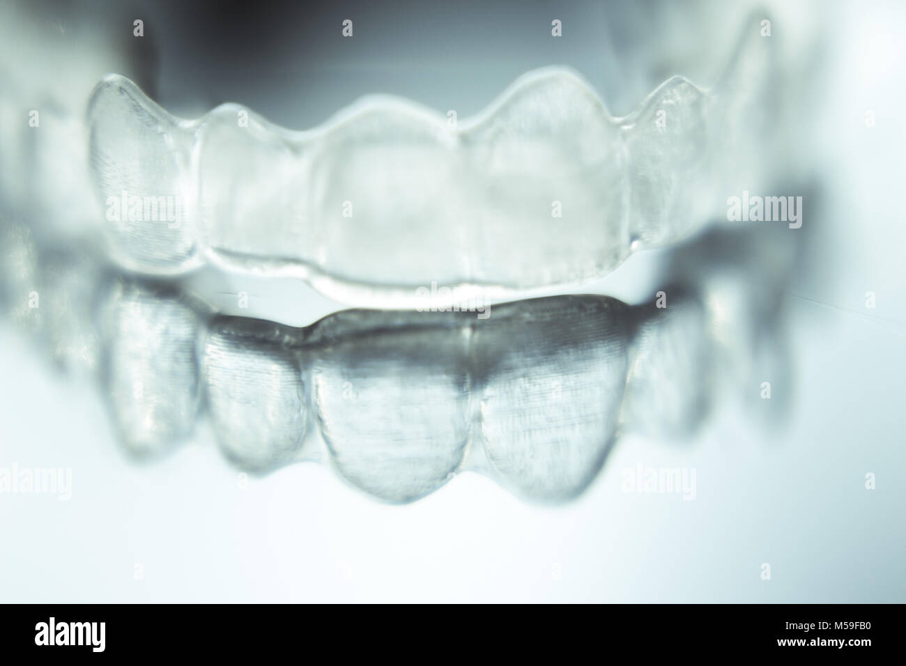 Dental aligner. Invisible dental orthodontics Stock Photo - Alamy