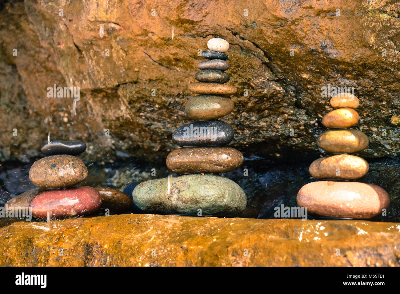 Rock Stacking at the beach Stock Photo - Alamy