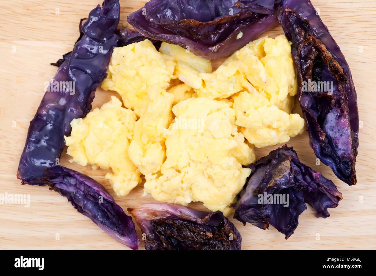 Roasted red, purple organic cabbage and organic duck scrambled eggs on ...