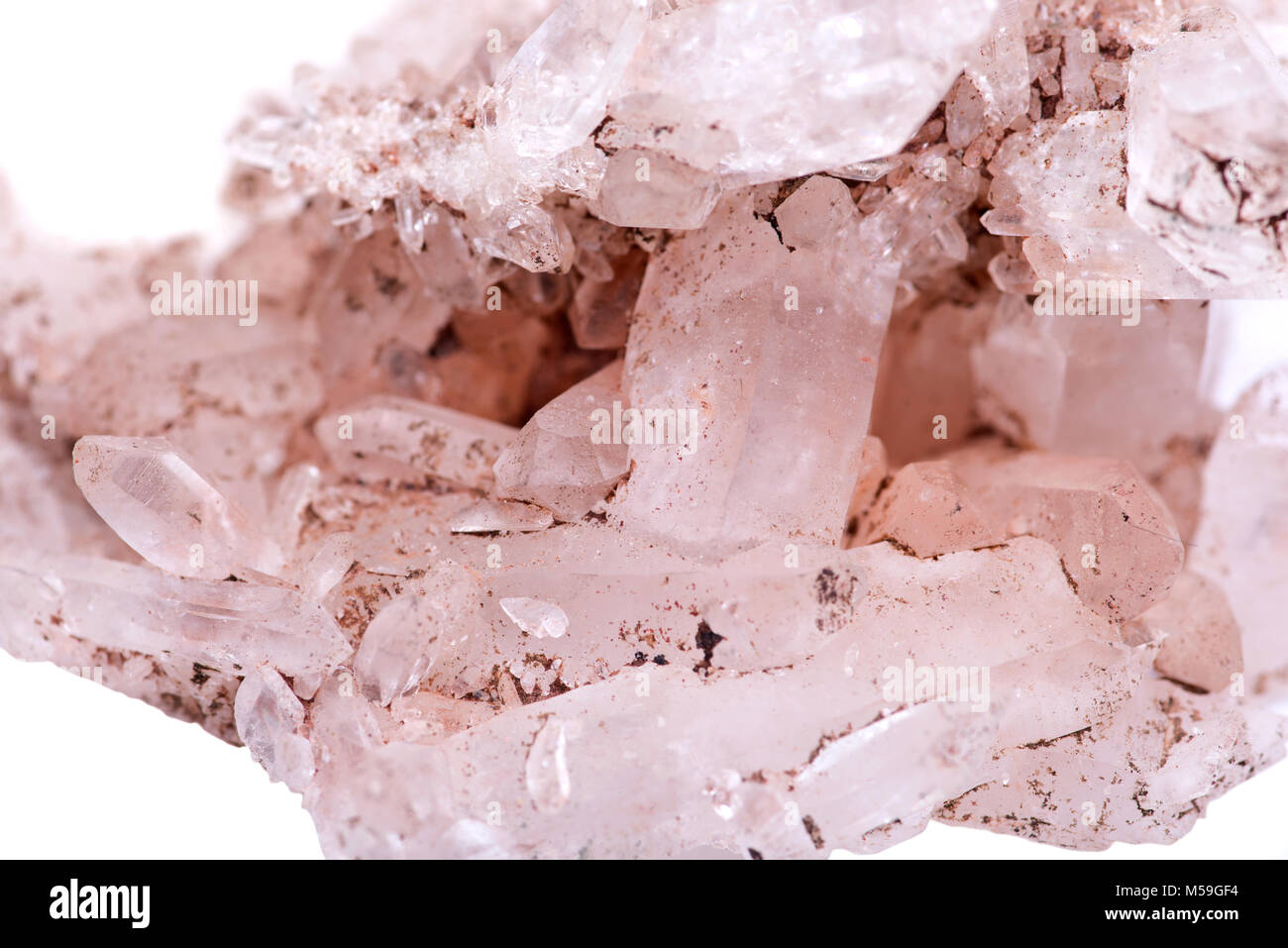Himalayan clear quartz cluster with hematite inclusions isolated on ...