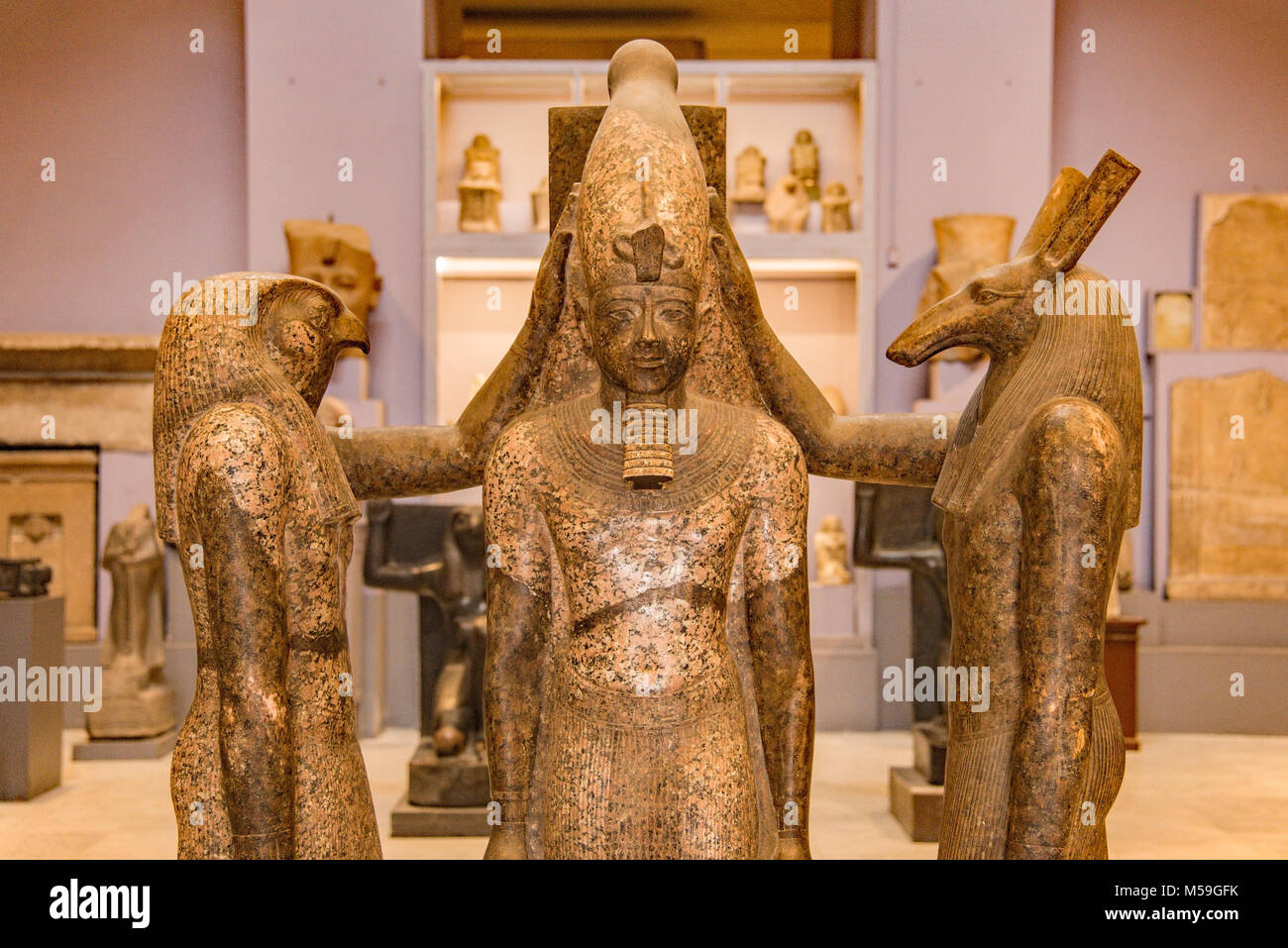 Ancient Egyptian Deities with pharaoh figure in the Cairo Museum of ...