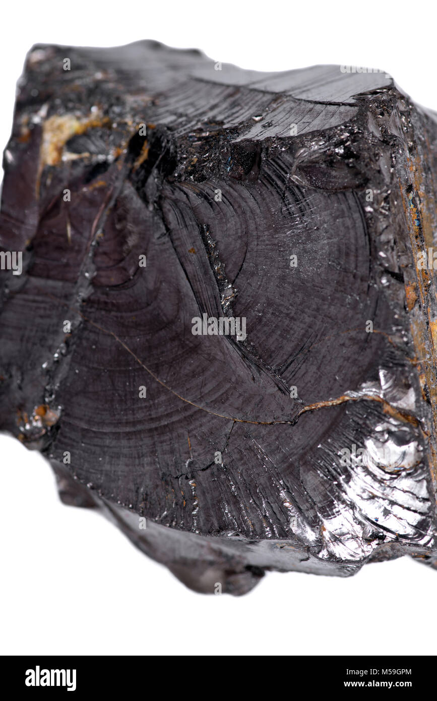 Rough lustrous elite shungite from Russia isolated on white background ...