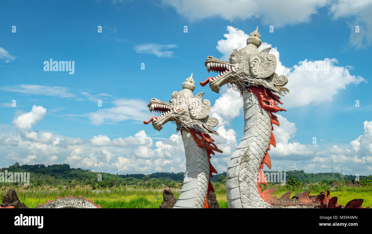 Statue of twin dragon, mythological creatures from Kutai tribe, with ...