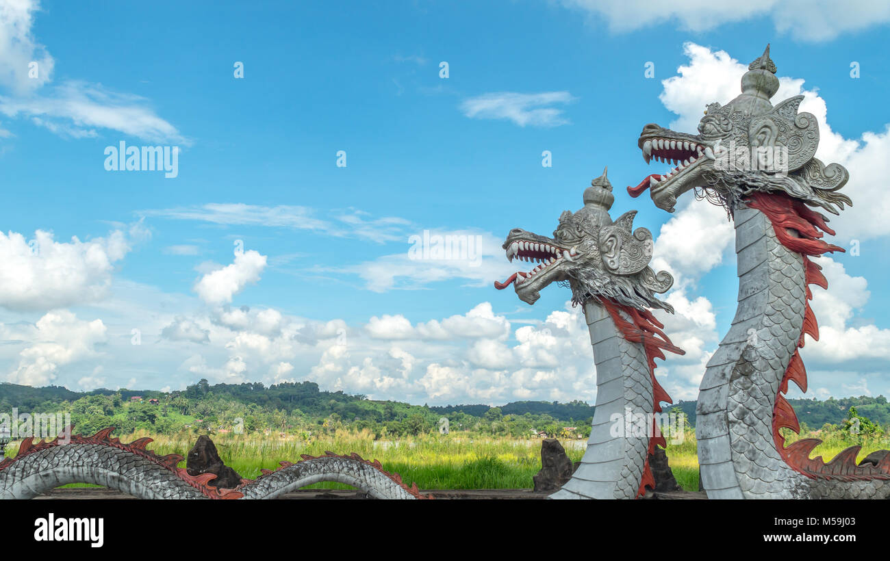 Statue of twin dragon, mythological creatures from Kutai tribe, with ...