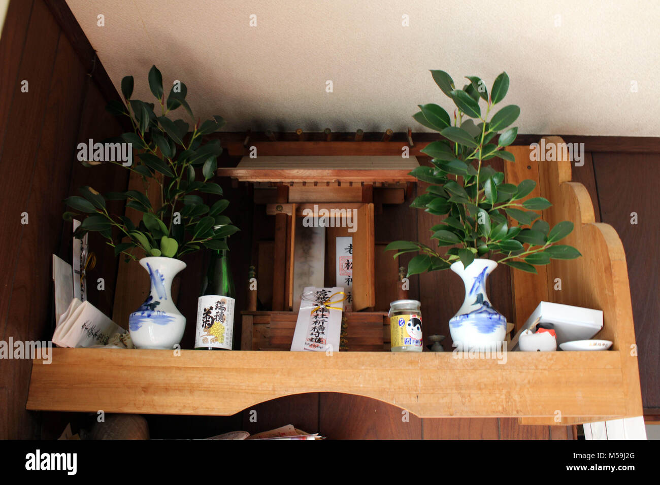 A wooden-Japanese Shinto altar for worship. Translation: "Kamisama" is ...