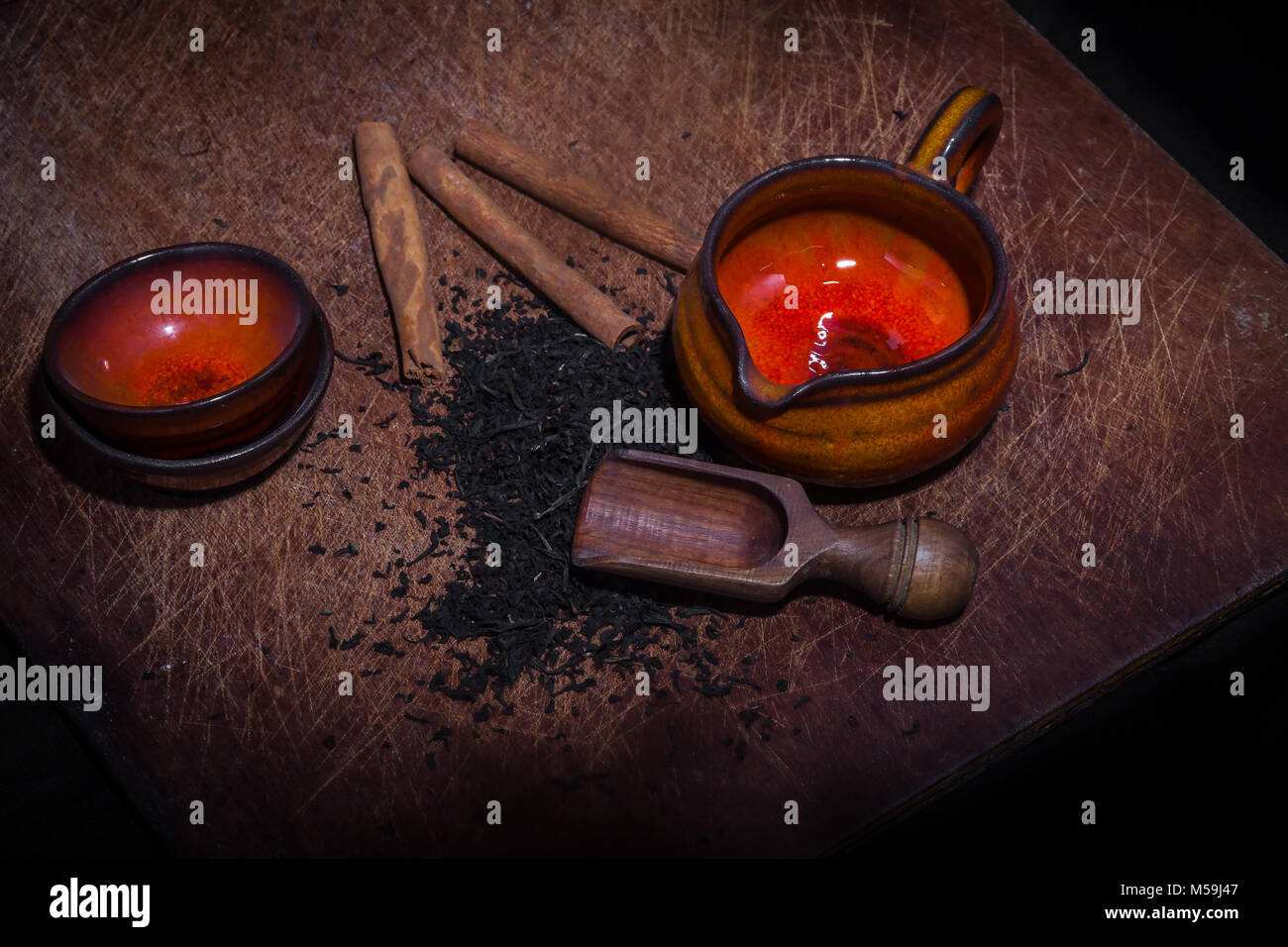 Essentials for tea making on wooden board Stock Photo - Alamy