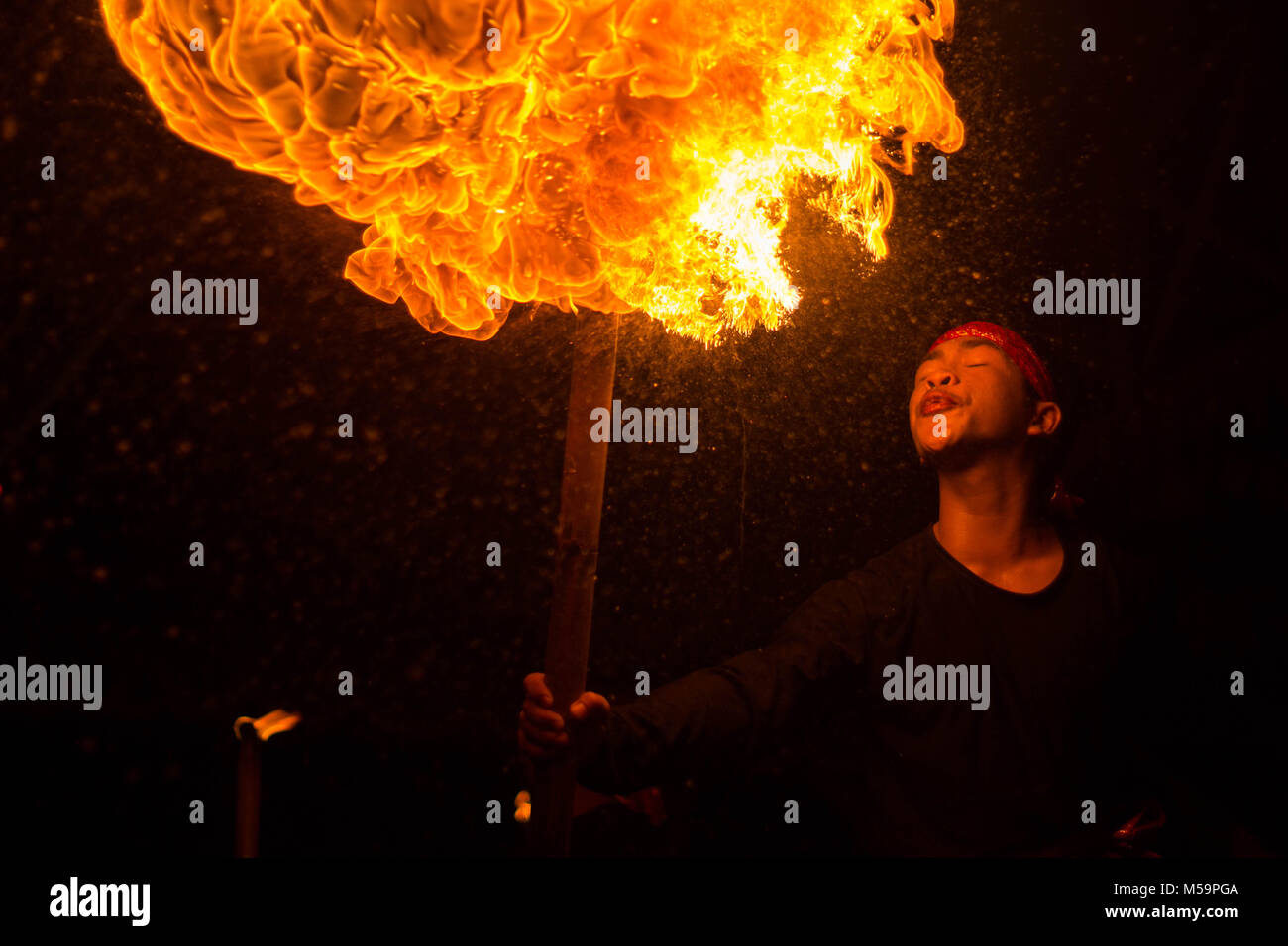 Playing with fire Stock Photo - Alamy