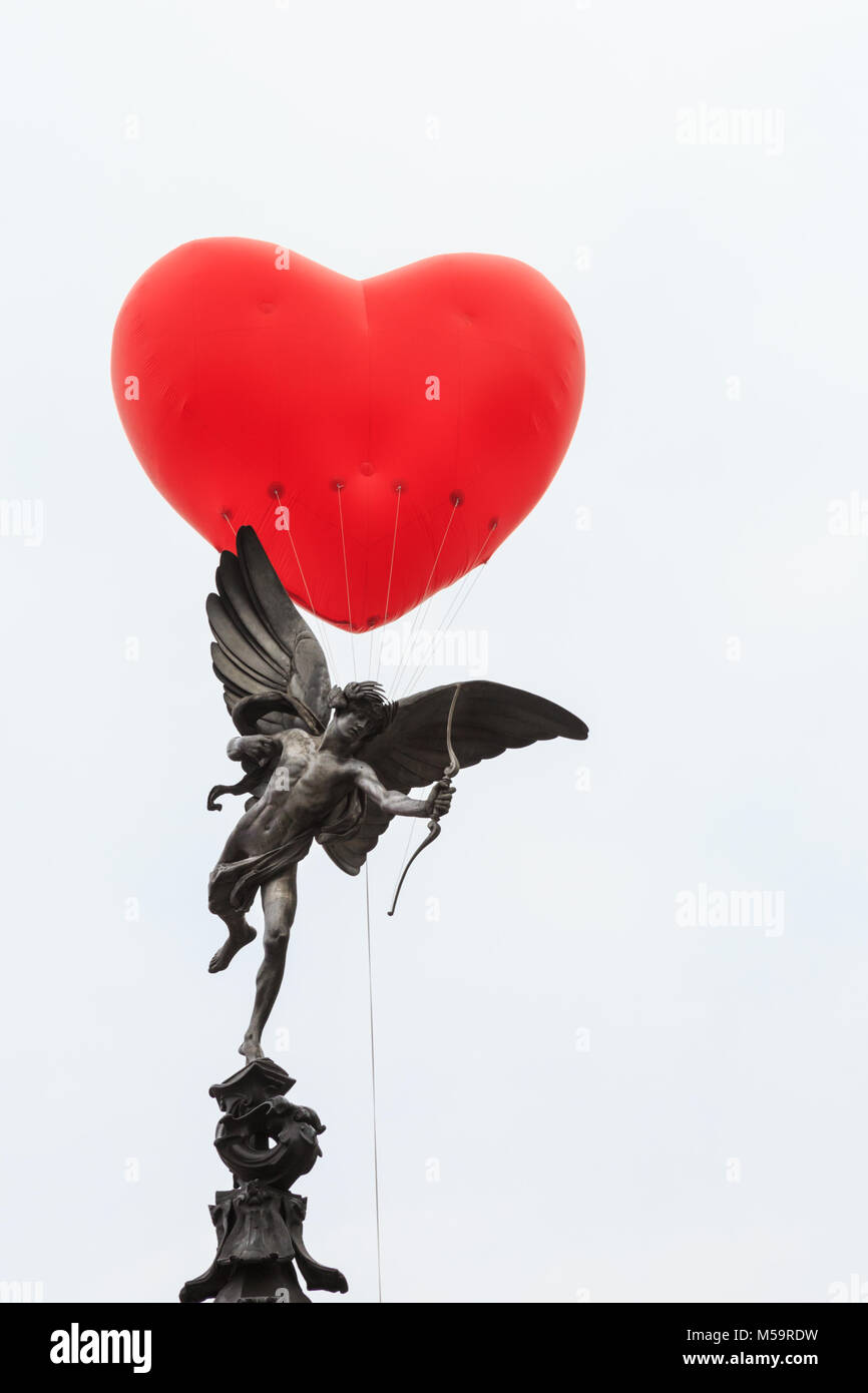 Piccadilly Circus, London, 21st Feb 2018. A chubby heart appears over ...