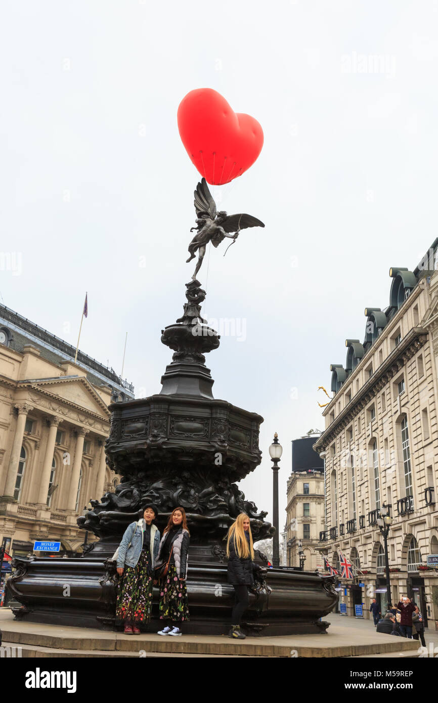 Piccadilly Circus, London, 21st Feb 2018. A chubby heart appears over ...