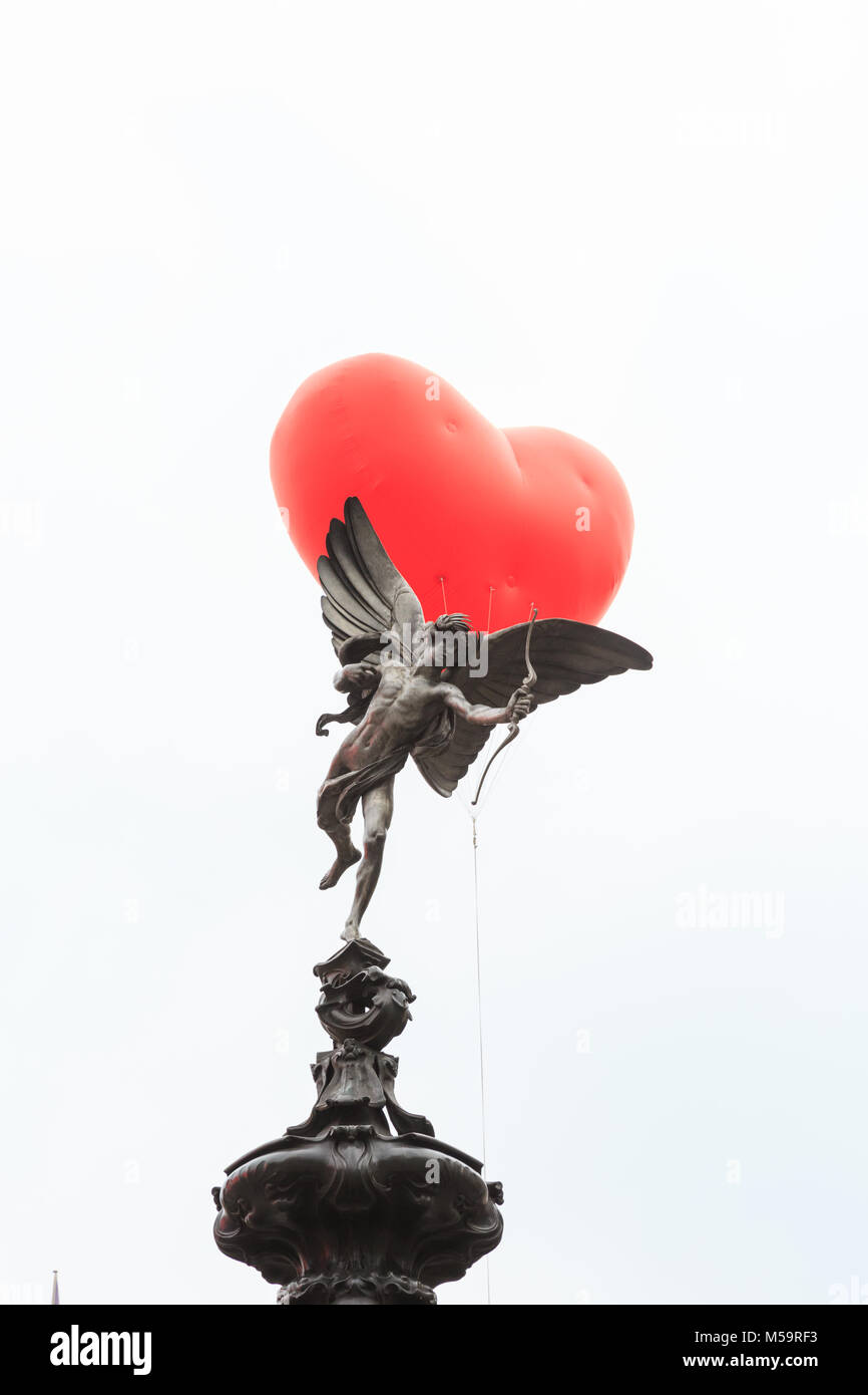 Piccadilly Circus, London, 21st Feb 2018. A chubby heart appears over ...