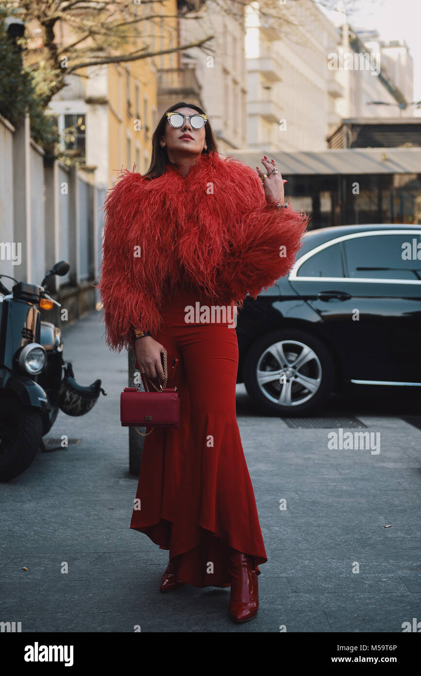 Milan, Italy. 21st Feb, 2018. Fashion girl posing to photographers ...