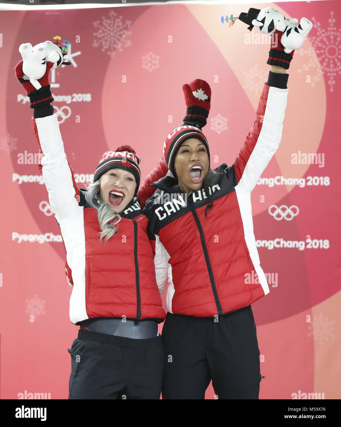 Pyeongchang, South Korea. 21st Feb, 2018. Kaillie Humphries (L) and ...