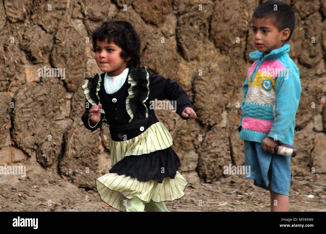 Peshawar. 21st Feb, 2018. Afghan refugee children play at a slum in ...