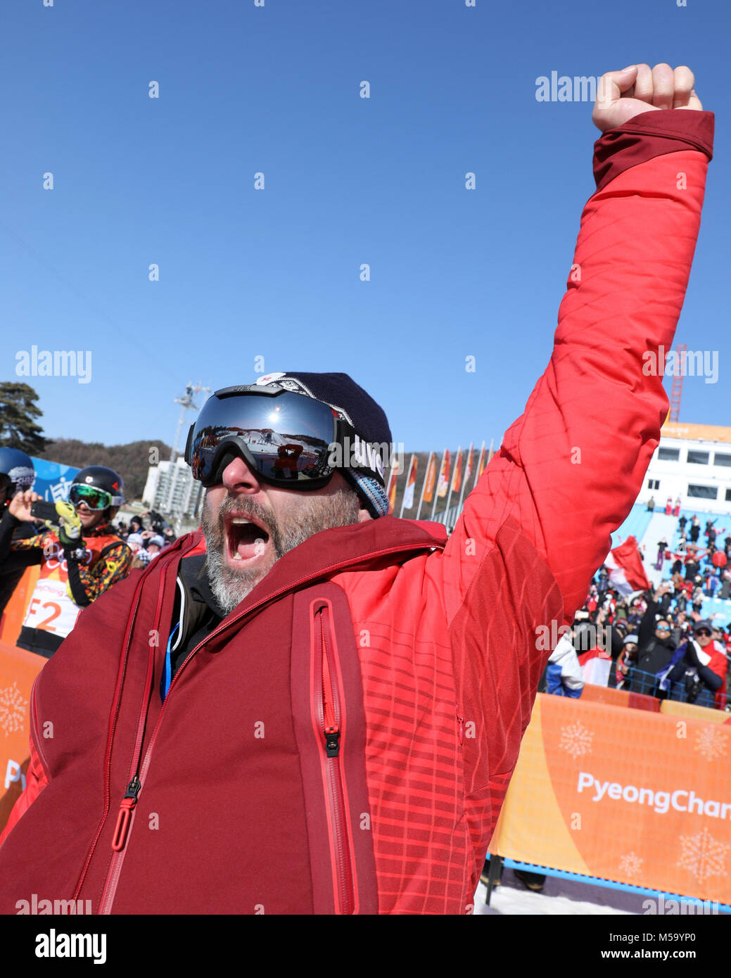 PyeongChang, South Korea. 21st Feb, 2018. A Canadian fan cheers during ...
