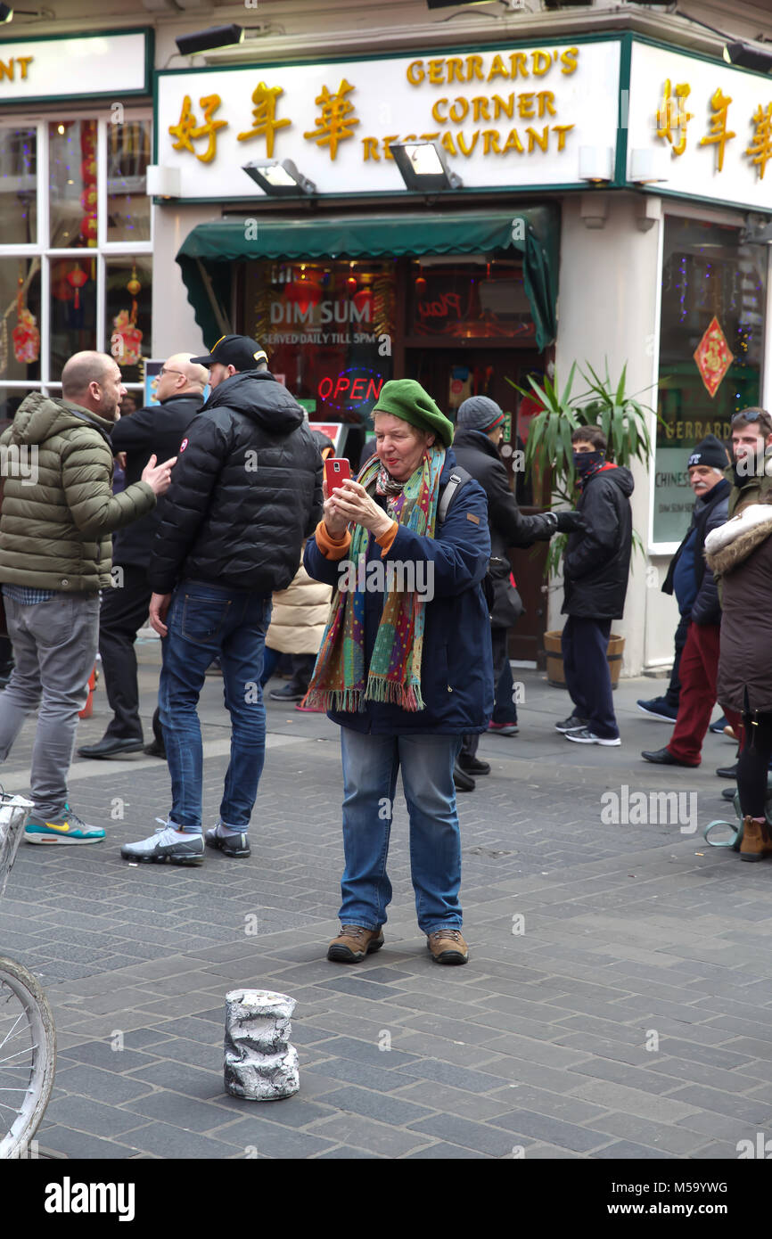 London, UK. 21st Feb, 2018. Dull and overcast day in London as people ...