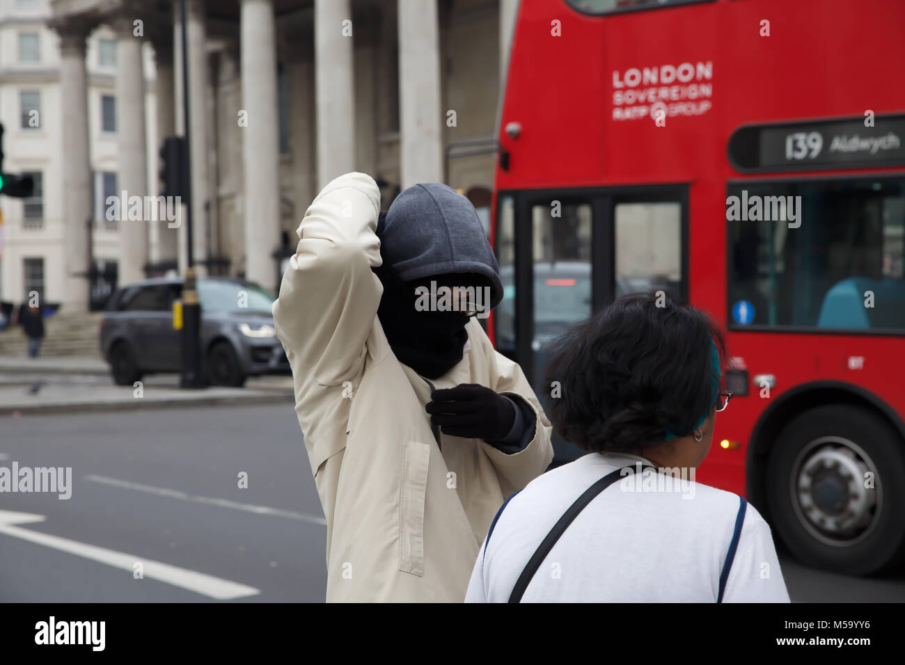 London, UK. 21st Feb, 2018. Dull and overcast day in London as people ...