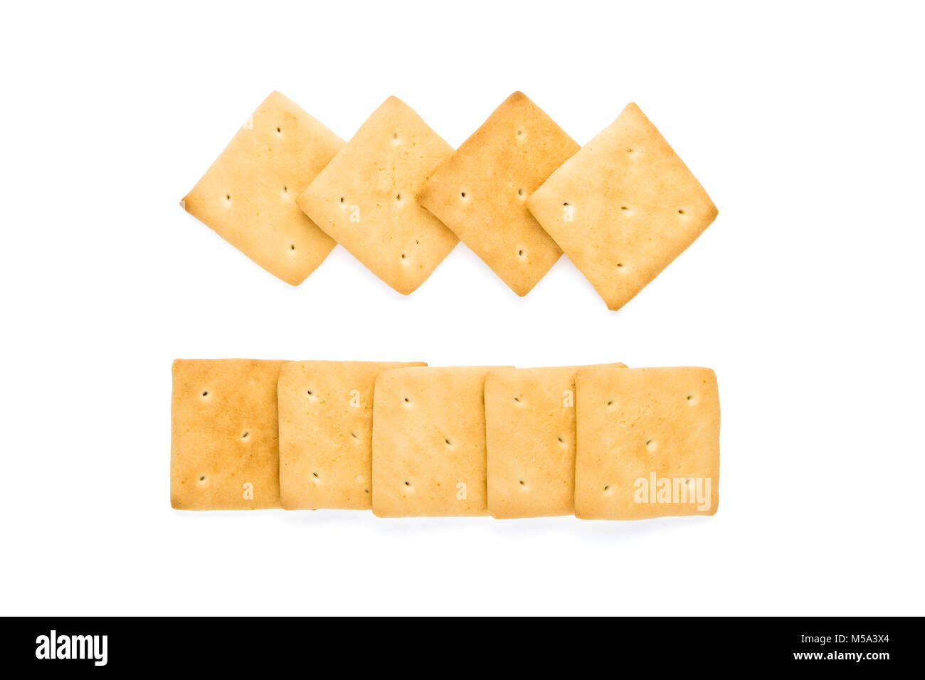 light breakfast, crackers lined up in two rows, isolated on white ...