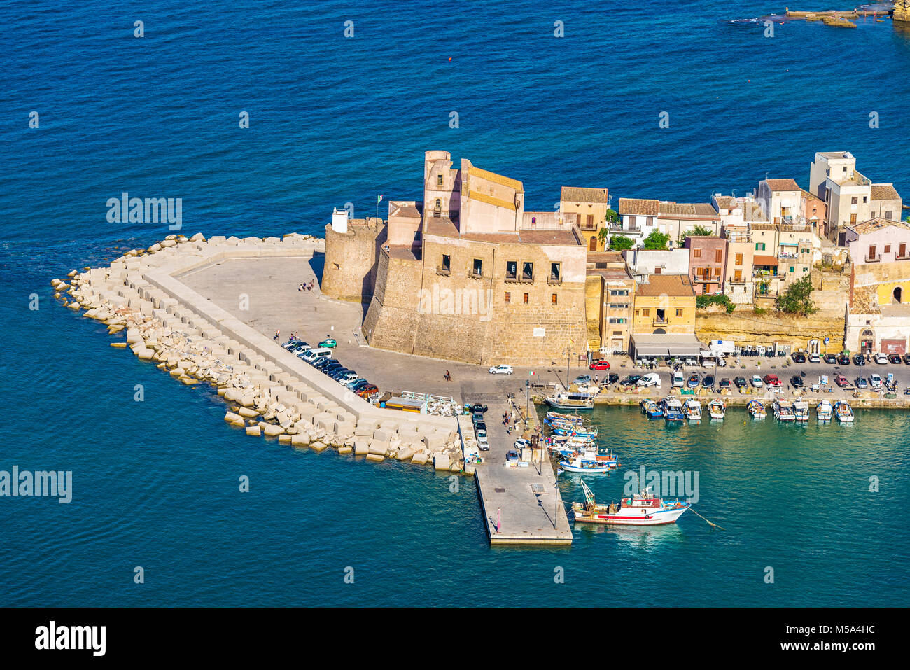 Overview of Castellammare del Golfo with its marina and its medieval ...