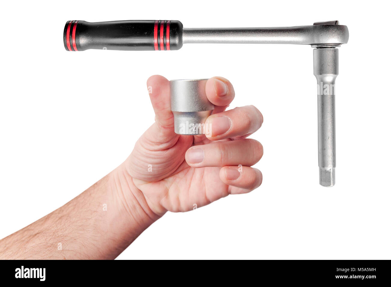 Hand holding replaceable head of automotive mechanic tool for ...