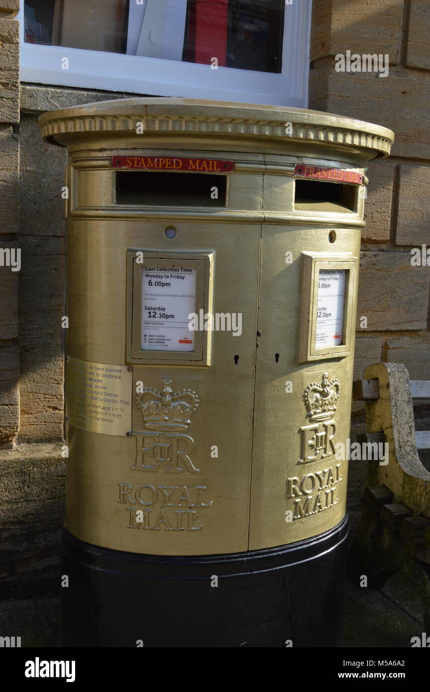 classic gold postbox in Sherborne High Street commemorating Olympic ...