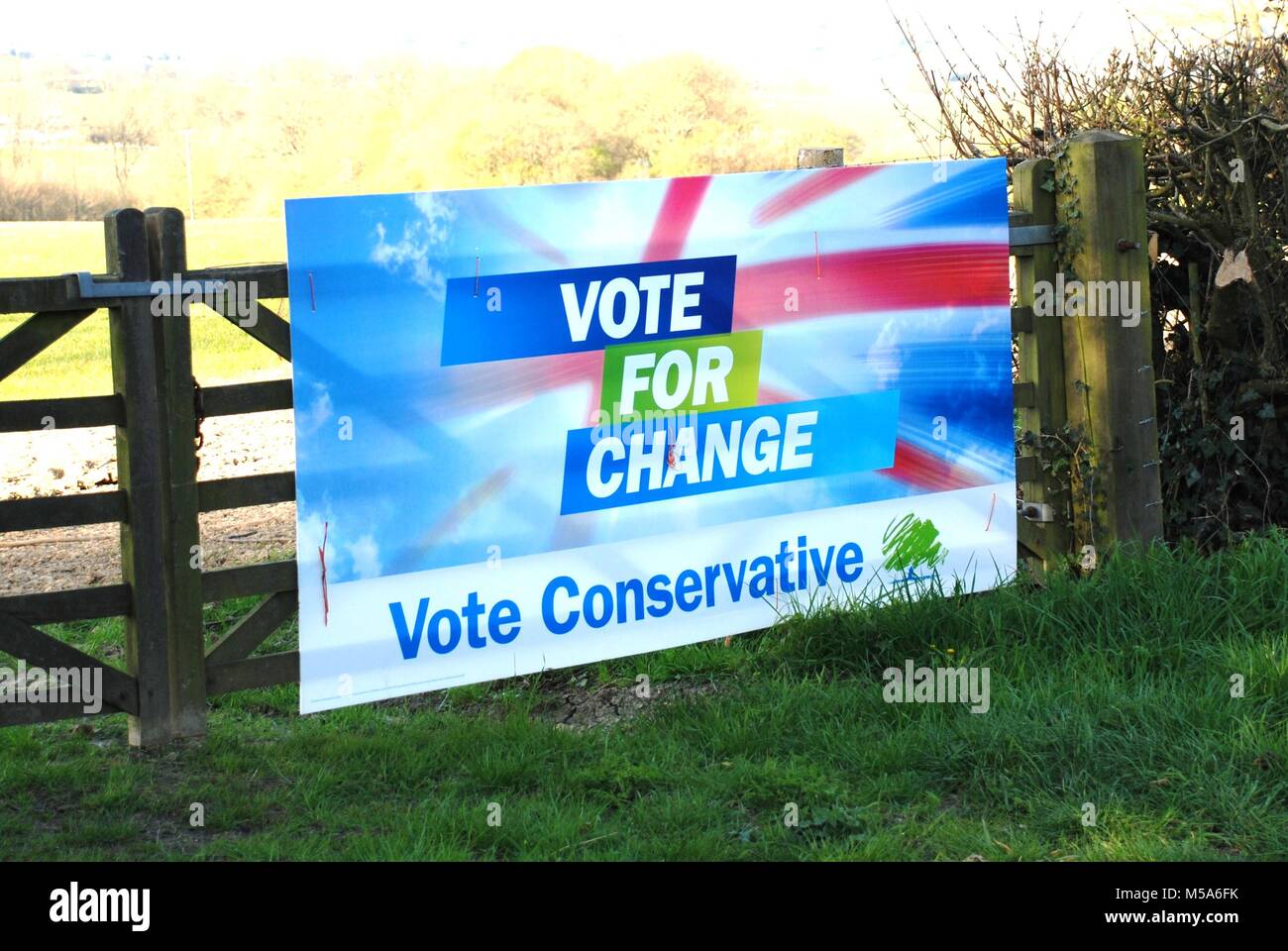 A General Election campaign poster for the Conservative party on a farm ...